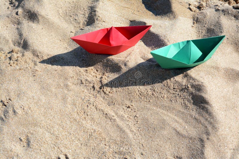 Two Color Paper Boats on Sandy Beach, Above View. Space for Text Stock ...