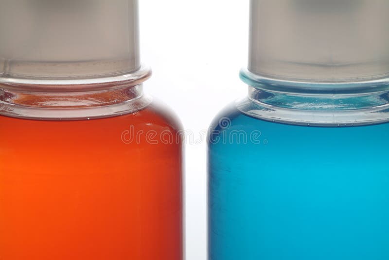 Two colored bottles stock image. Image of silhouettes, form - 386145