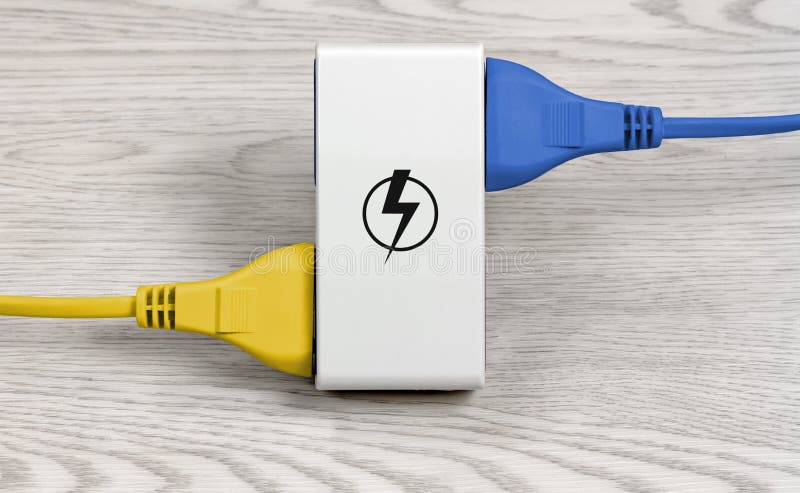 Two Colored Cables Connected To a Multiple Socket Stock Image - Image ...