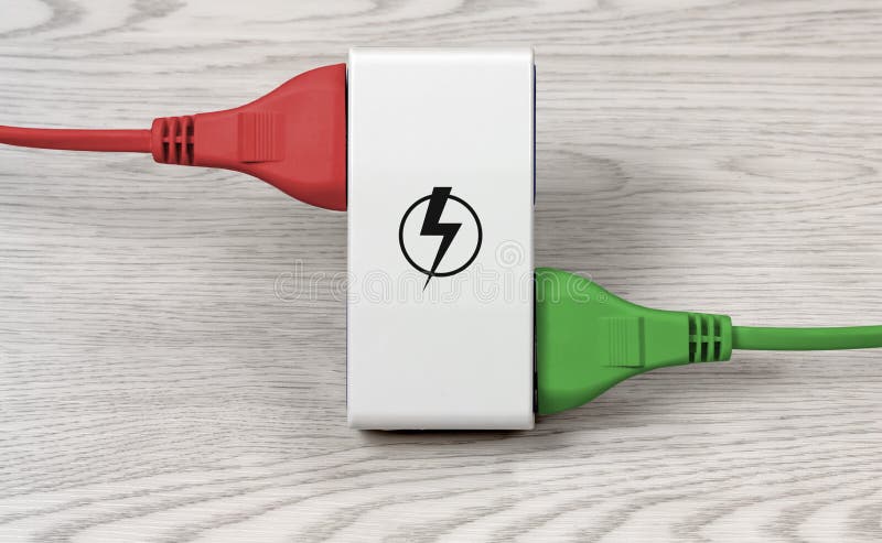 Two Colored Cables Connected To a Multiple Socket Stock Photo - Image ...