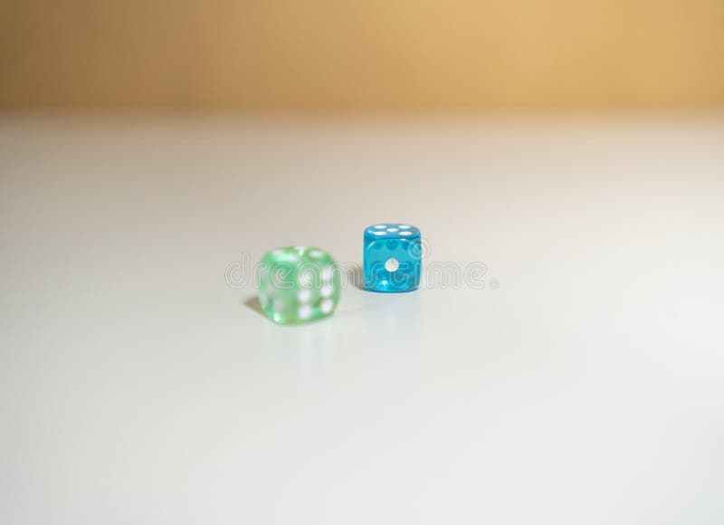 Two Colored Dice One in Focus Stock Image - Image of block, throw ...