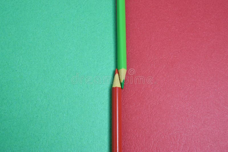 Two Colored Pencils Split a Picture in Half in Two Different Colors ...