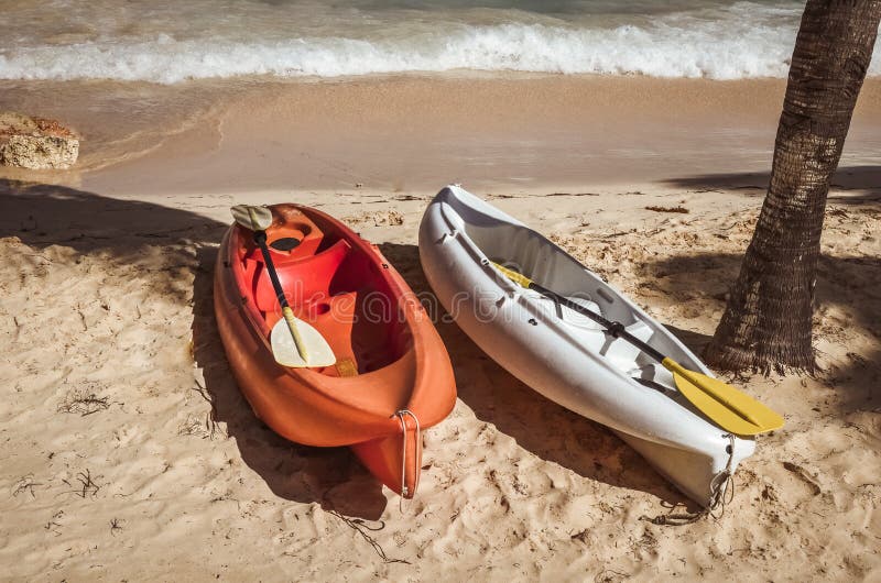 Two Colorful Kayaks on Sand Beach Stock Image - Image of beach, canoe ...