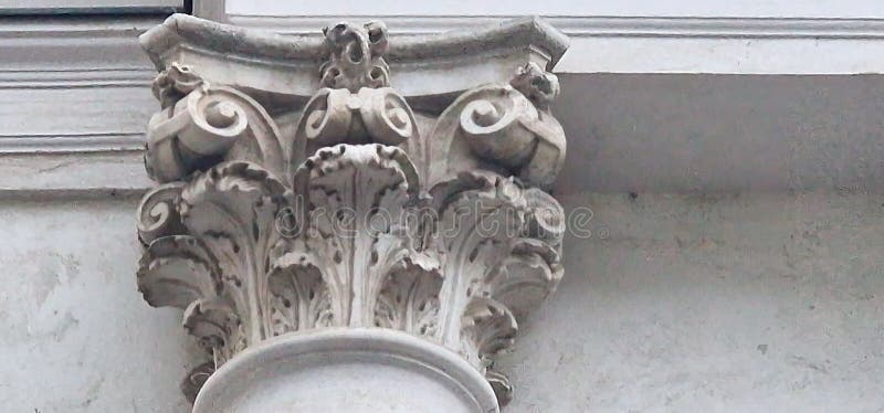 Two Column Heads with Leaf Decorations Stock Image - Image of ...