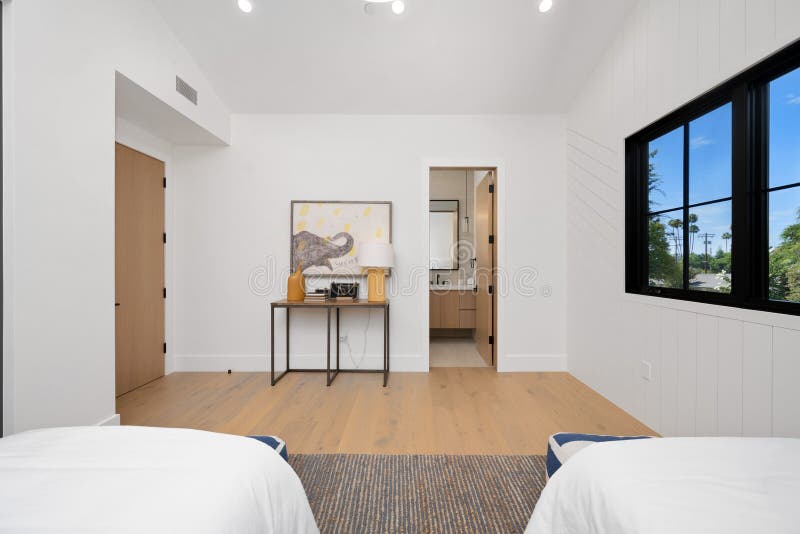 Comfortable Single Beds Located Side by Side on the Floor Editorial ...