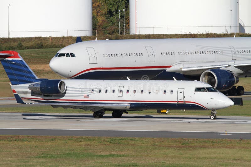 Two Commercial Jets Await Clearance To Take Off Stock Image - Image of ...