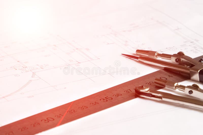Two Compasses and a Metal Ruler on the Background of an Architectural ...