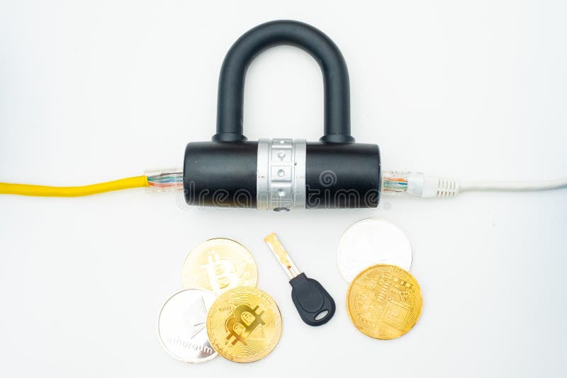 Two Computer Network Cables Going through a Lock with a Key and a ...