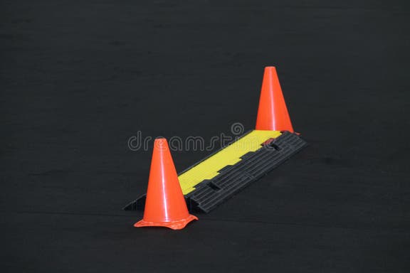Two Cones Marking a Ramp. stock photo. Image of marking - 283200234
