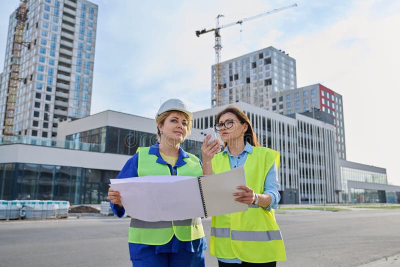 Two Confident Women Talking Working on Construction of Residential ...