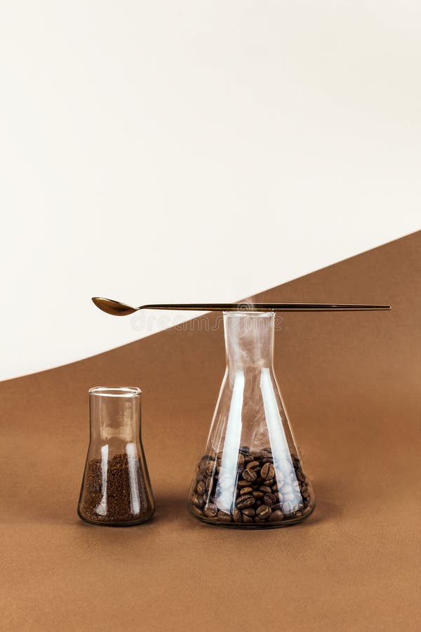 Two Conical Flasks with Ground Coffee and Beans Stock Photo - Image of ...