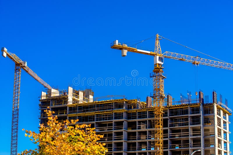 Construction Cranes are Building a House Stock Image - Image of ...