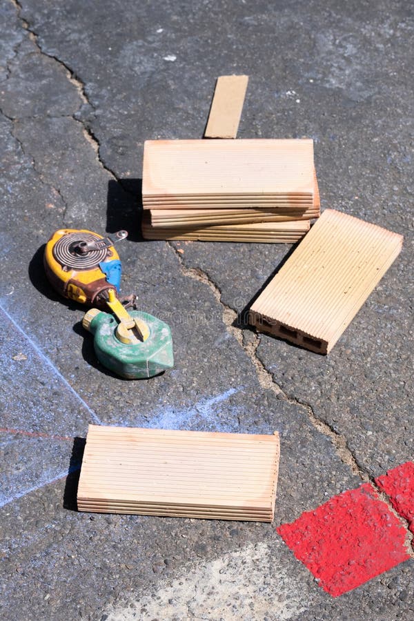 Two Construction Drawings and Bricks on a Construction Site Stock Photo ...