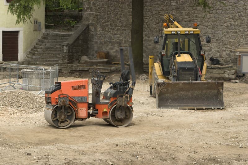 Two Construction Vehicles in Building Land Stock Image - Image of ...