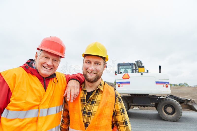Two Construction Workers As Colleagues on the Construction Site Stock ...