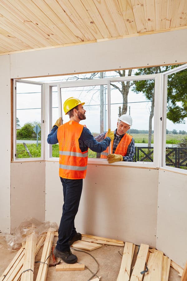Two Construction Workers during Modernization Stock Image - Image of ...