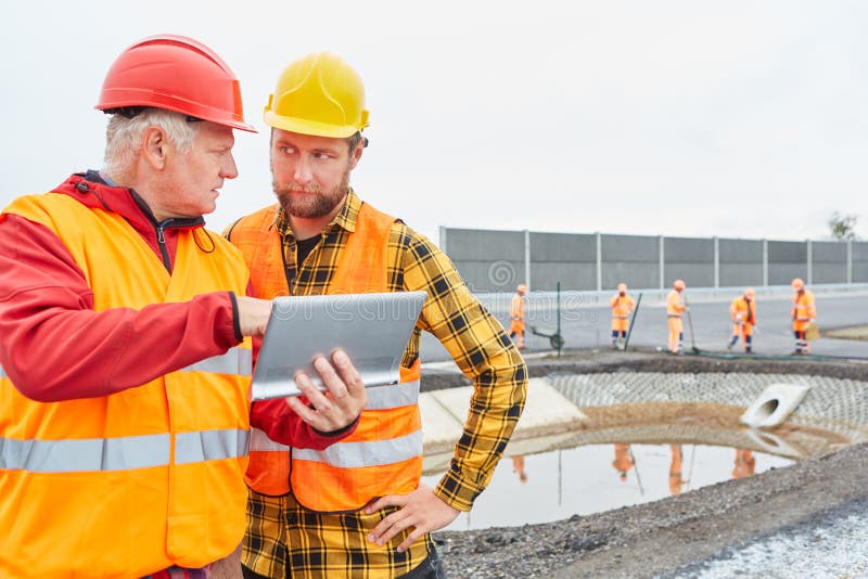 Workers with Tablet in Hand in Port Stock Photo - Image of building ...