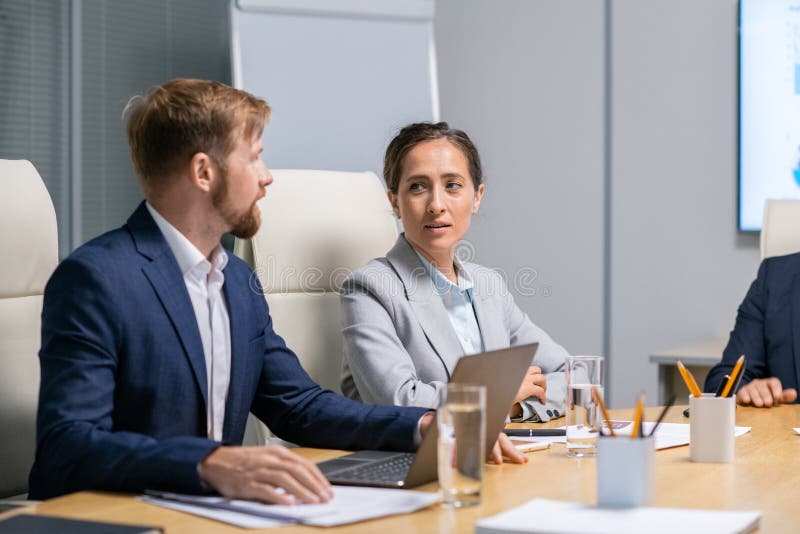 Two Contemporary Business People Discussing Conference Points Stock ...