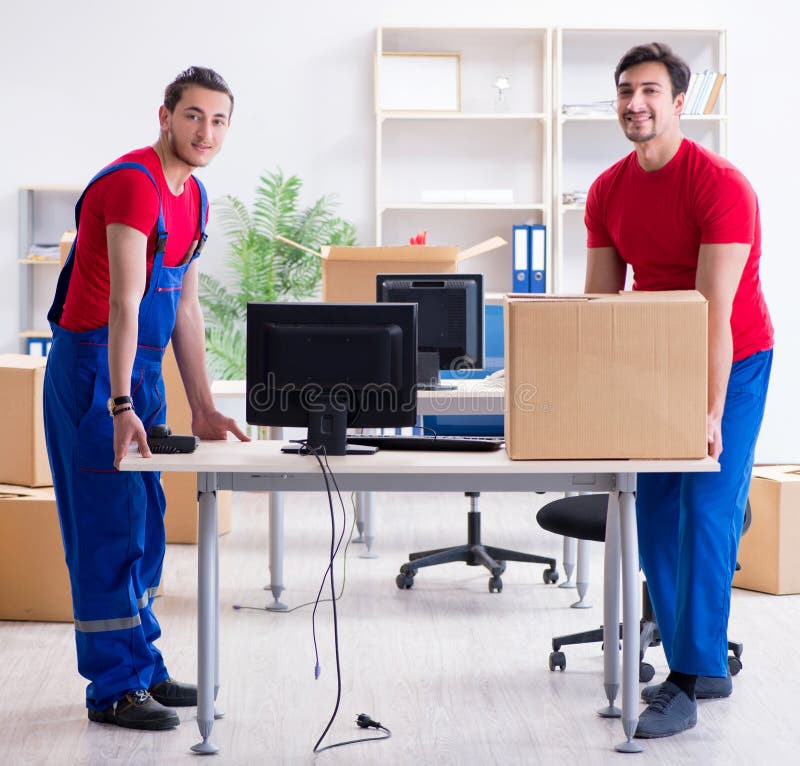 Two Contractor Employees Moving Personal Belongings Stock Photo - Image ...