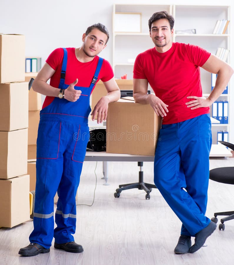 Two Contractor Employees Moving Personal Belongings Stock Photo - Image ...