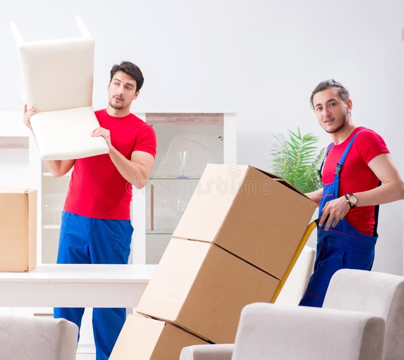 Two Contractor Employees Moving Personal Belongings Stock Photo - Image ...