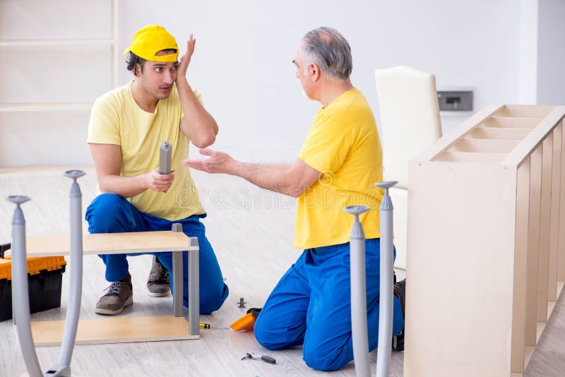 Two Contractors Carpenters Working Indoors Stock Image - Image of house ...