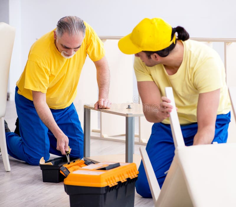 Two Contractors Carpenters Working Indoors Stock Image - Image of ...
