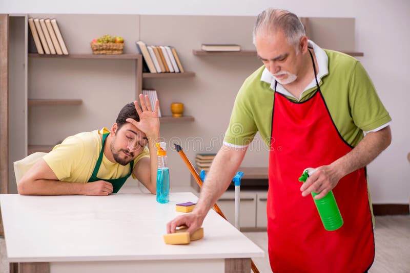 Two Male Contractors Cleaning the House Stock Image - Image of cleaning ...