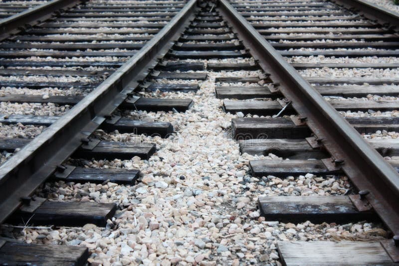 Two Converging Train Tracks Stock Photo - Image of rocks, travel: 16533780