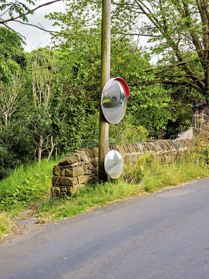 Two Convex Traffic Mirrors Mounted at a Rural Road Intersection ...