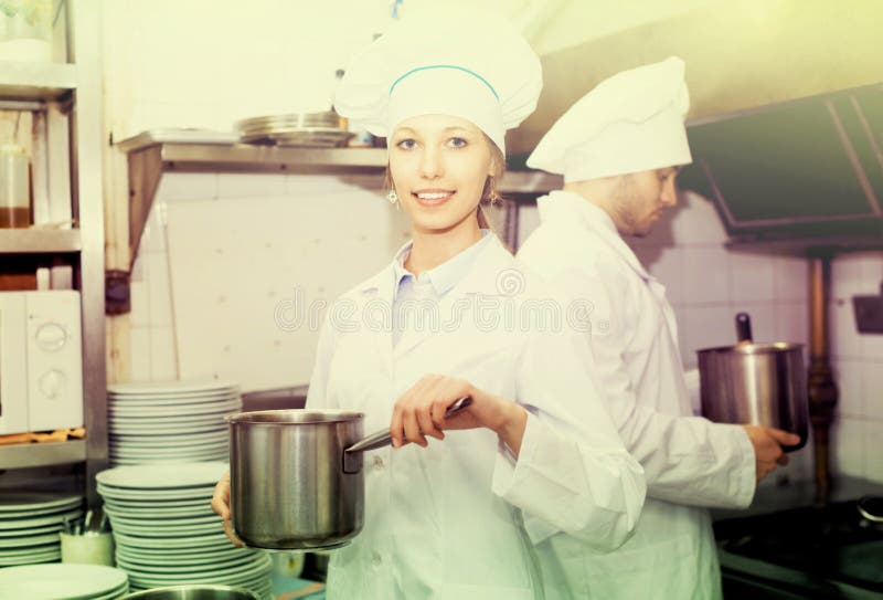 Two Cooks at Restaurant Kitchen Stock Photo - Image of lifestyle, smile ...
