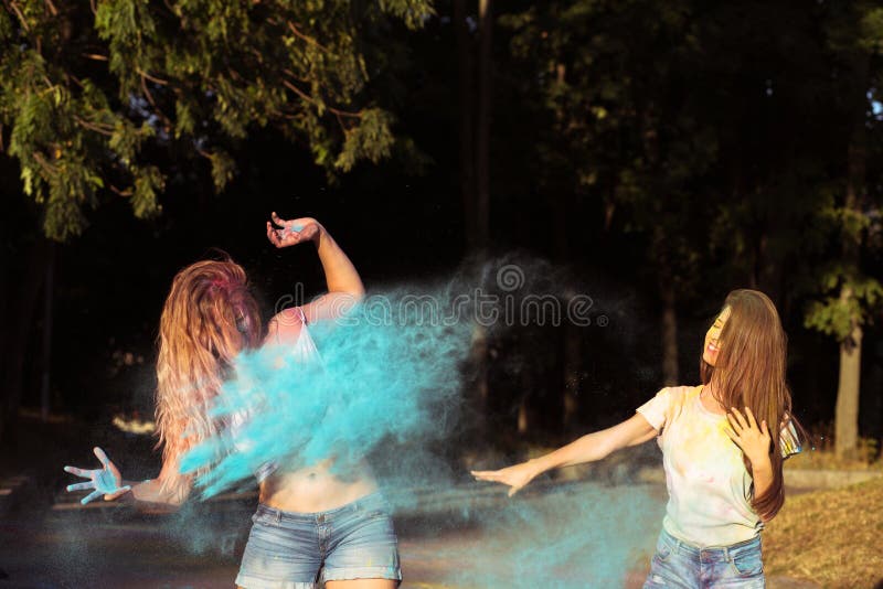 Two Cool Young Woman Friends Having Fun with Exploding Holi Powder ...