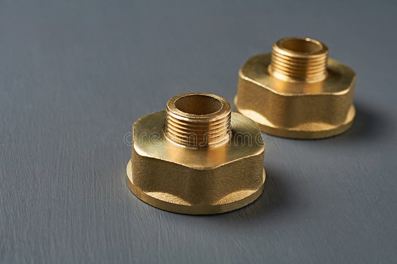 Two Copper or Bronze Fittings with Thread for Small and Big Pipe Lies ...