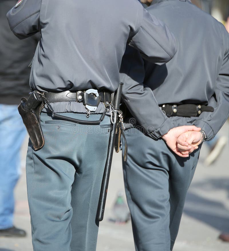 Two Cops with Uniform and Handcuffs in the City Stock Photo - Image of ...