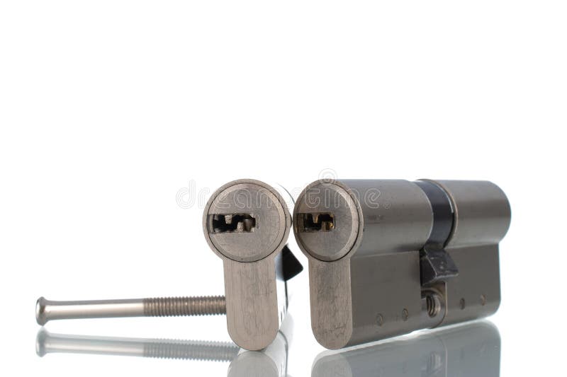 Cores of Locks with Keys, Close-up Isolated on White. Stock Photo ...