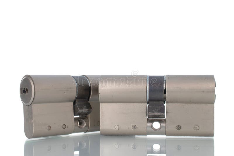 Cores of Locks with Keys, Close-up Isolated on White. Stock Photo ...