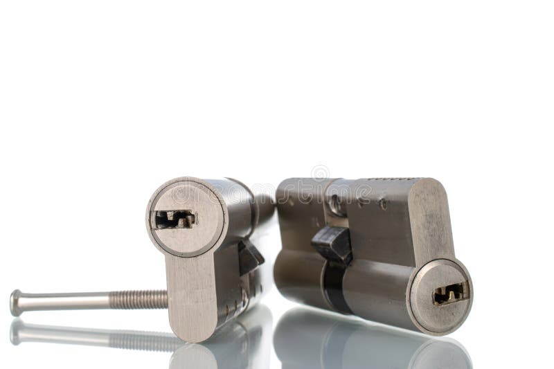 Cores of Locks with Keys, Close-up Isolated on White. Stock Photo ...