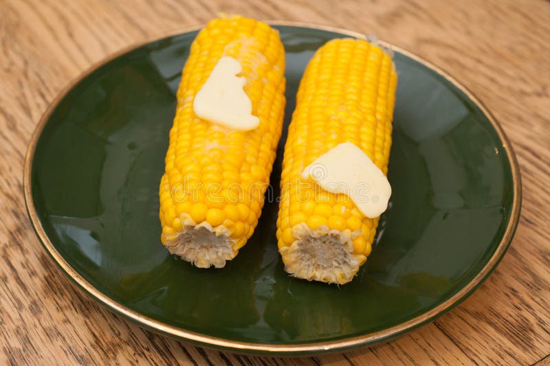 Two Corn on the Cobs with Melted Butter Stock Image - Image of meal ...