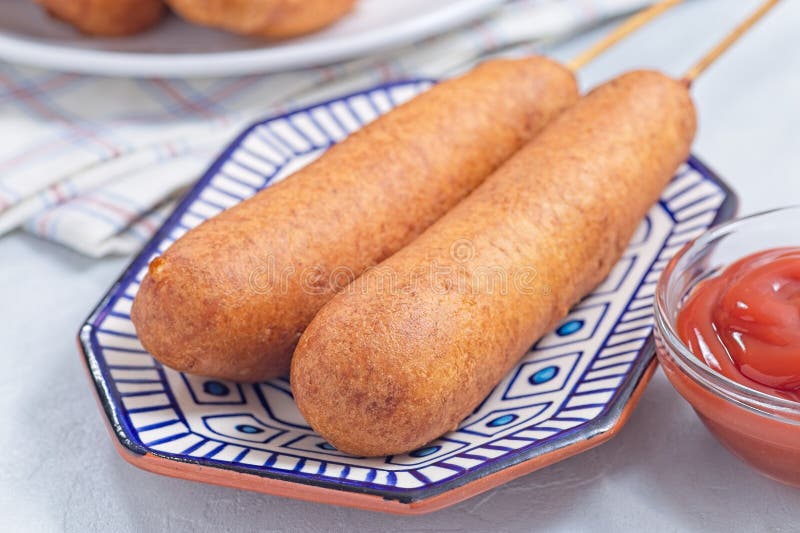 Two Corn Dogs on White Blue Plate, Served with Ketchup, Horizontal ...