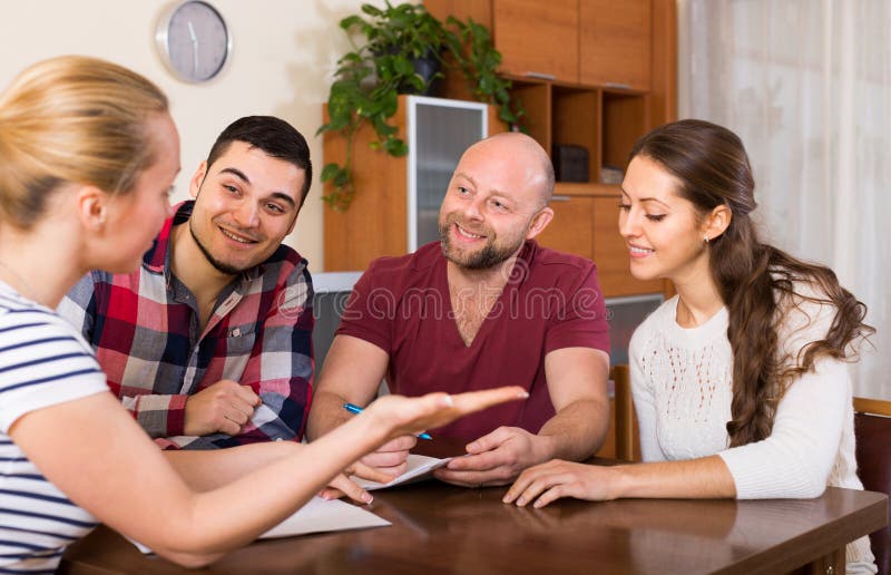 Two Couples Discussing And Smiling Stock Image - Image of european ...