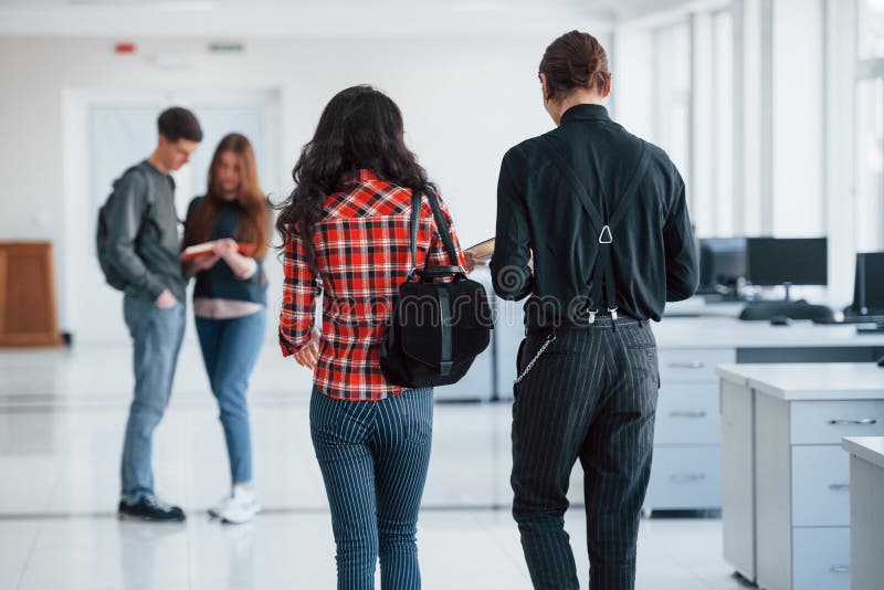 Two Couples. Group of Young People Walking in the Office at Their Break ...