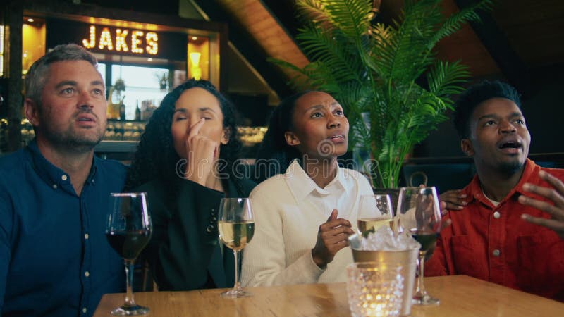 Two Couples Playing a Guessing Game on Their Date Stock Video - Video ...