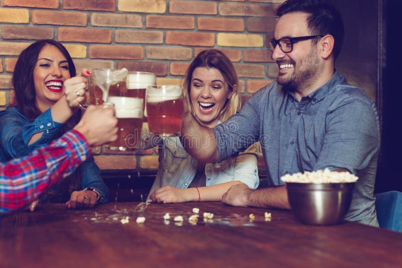 Two Couples Went on a Double Date To Pub on a Saturday Night. - Image ...