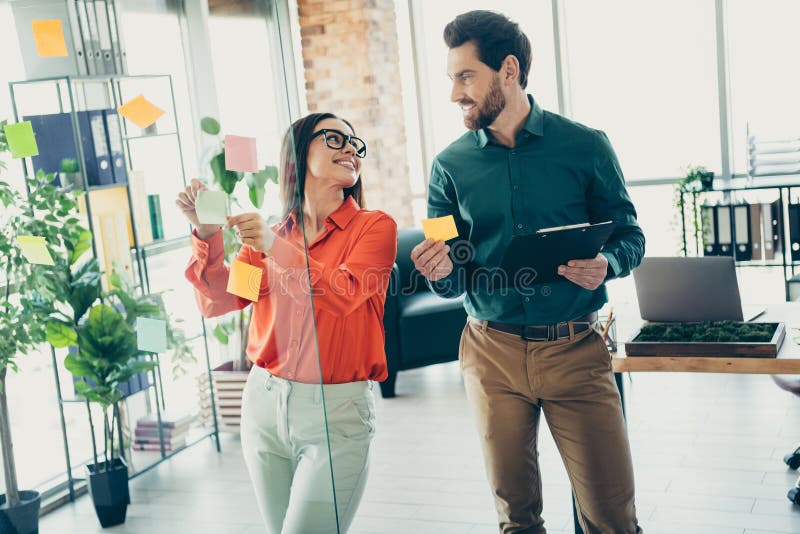 Collaborative Colleagues Exchanging Ideas with Colorful Notes in a ...