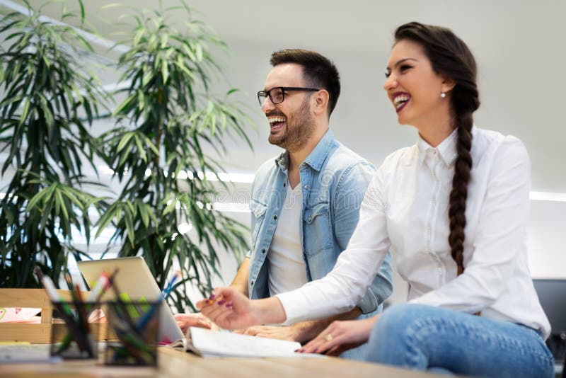 Two Coworkers Discussing Business Strategy in Modern Office Stock Photo ...