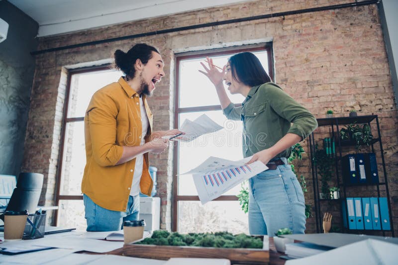 Colleagues Celebrating Successful Project Completion with Enthusiasm in ...