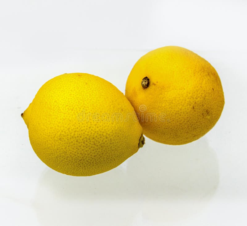 Two Cpuple of Natural Lemon Fruits Isolated on White Background Stock ...