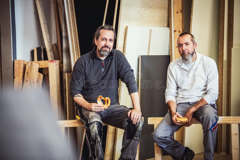 Two Craftsmen are Taking a Break in a Workshop Stock Image - Image of ...