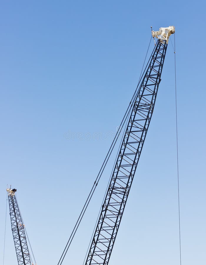 Two Crane Arms stock image. Image of heavy, crane, picking - 31199069