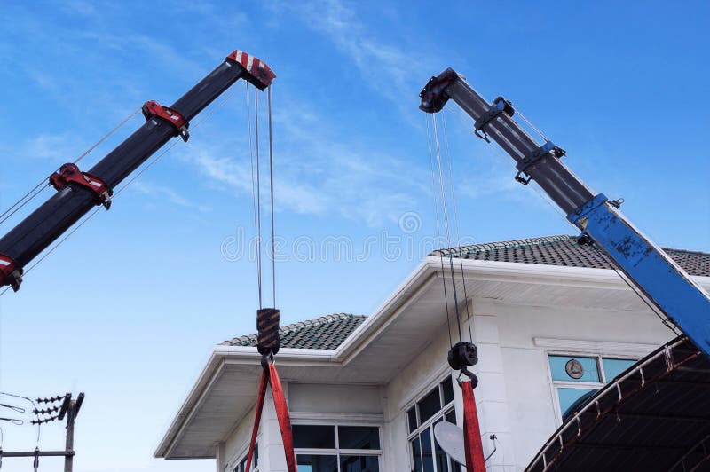 The Two Crane Webbing Sling of Loading Goods. Industrial Equipment ...